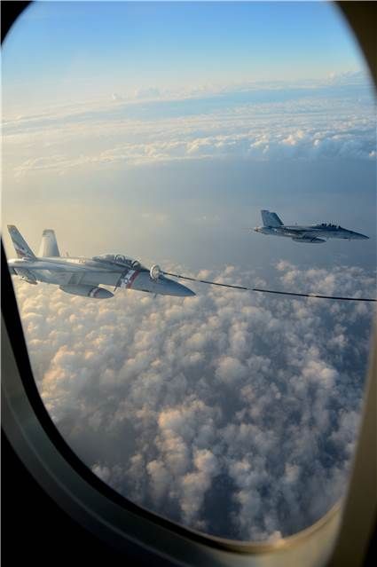 Photos- U.S. fighter jets gas up courtesy of RCAF Polaris refueller ...