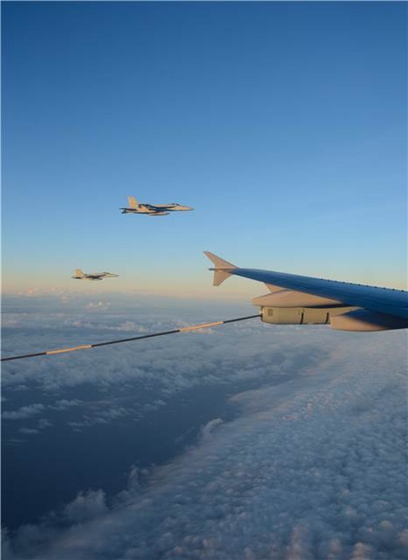 Photos- U.S. fighter jets gas up courtesy of RCAF Polaris refueller ...
