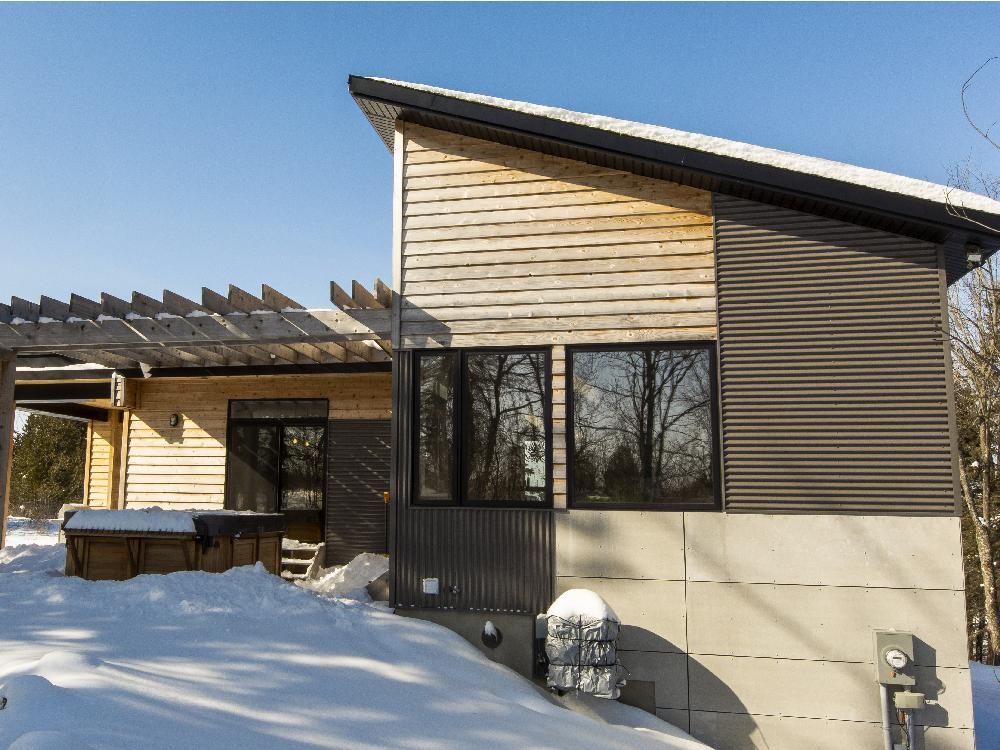 Custom home by Maple Leaf is built into a ridge (with video) | Ottawa ...