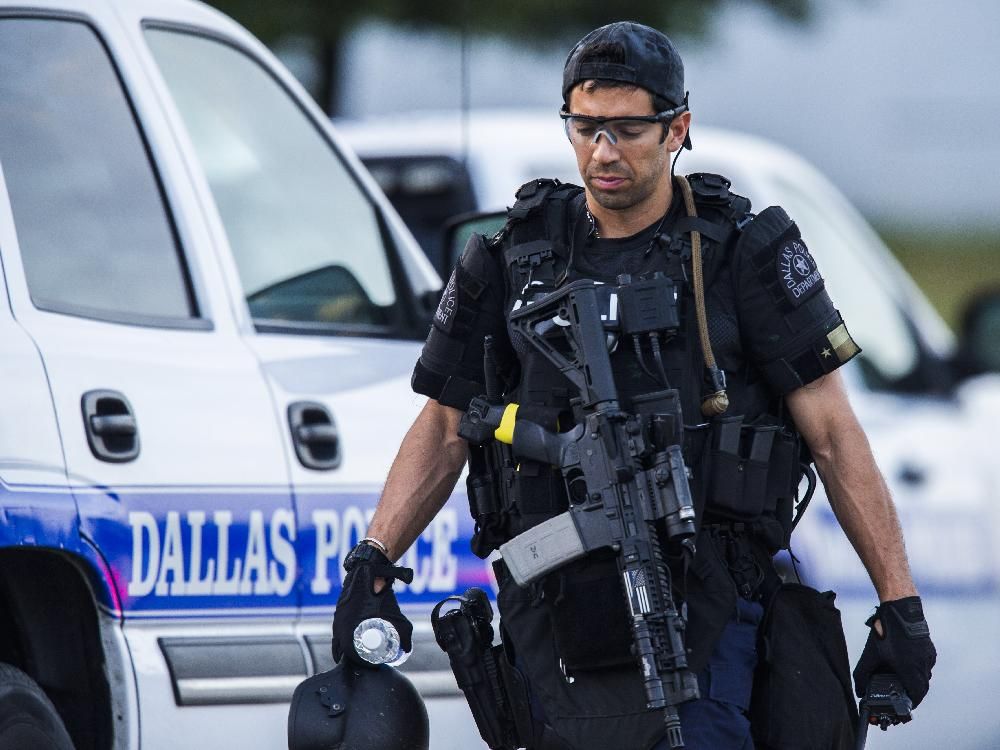 Sniper shoots suspect during standoff following attack on Dallas police ...