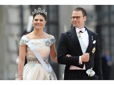 Photos: Swedish prince weds ex-reality TV star in royal ceremony ...