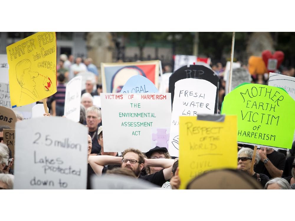 Protesters hold silent march for 'victims of Harperism' | Ottawa Citizen