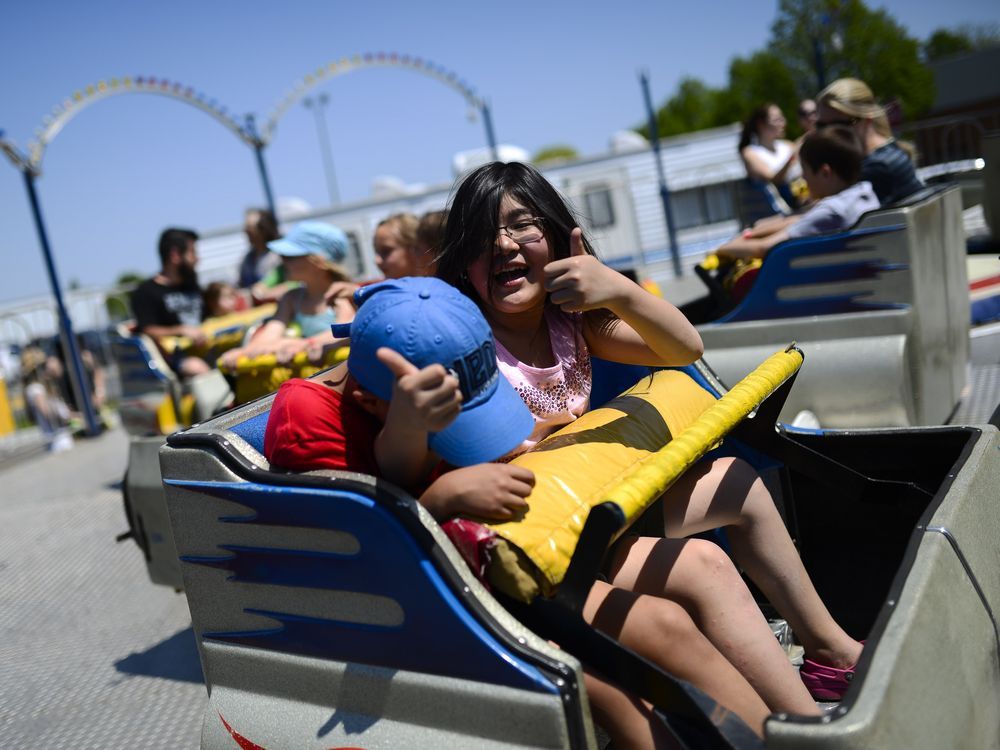 Capital celebrates 'summer' with tulips, midway and endless sunshine ...