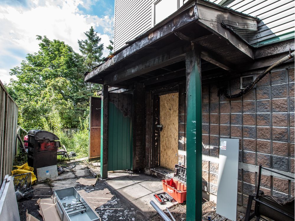 Arson unit investigating after mother, son rescued off roof of burning ...
