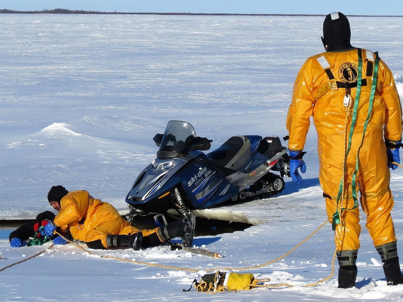 Rescuing a snowmobiler who has fallen through ice - Canadian Rangers ...