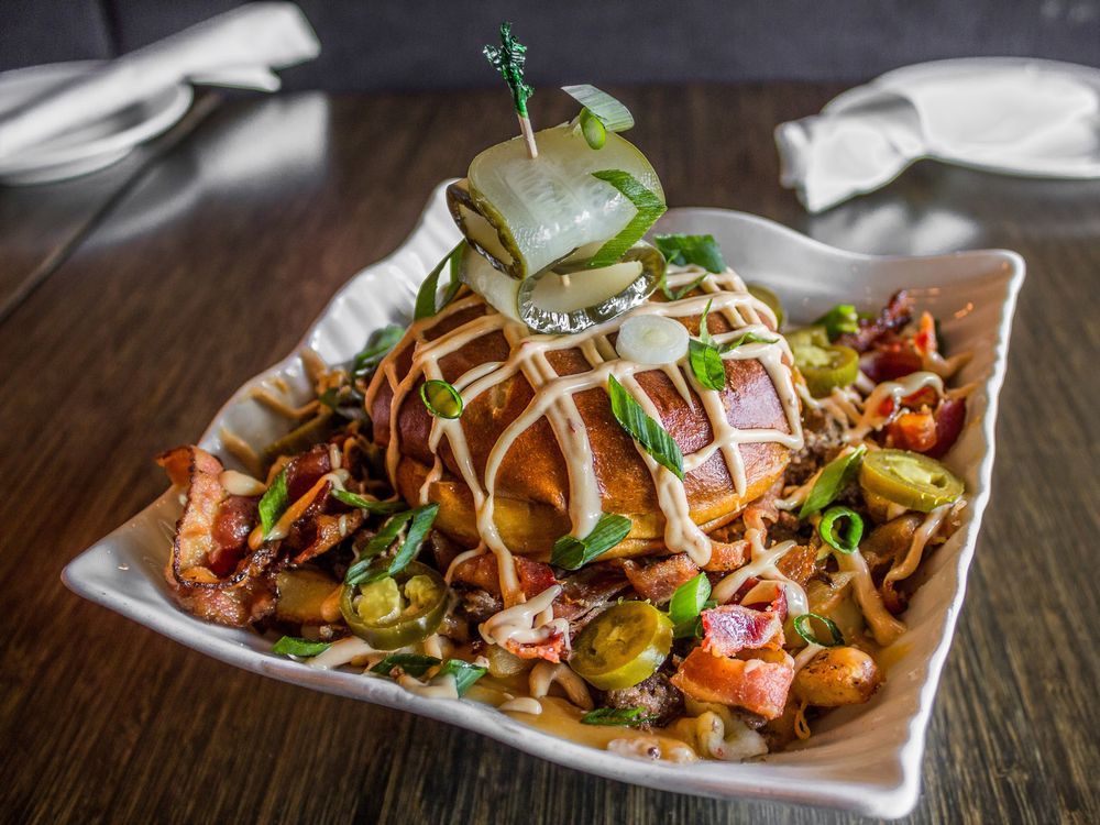 Which Ottawa restaurant's special poutine looks most edible to you ...