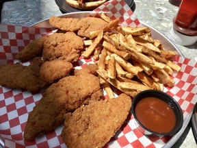 Dining Out: Ottawa's heavy-metal hangout, The Koven, serves burgers for ...