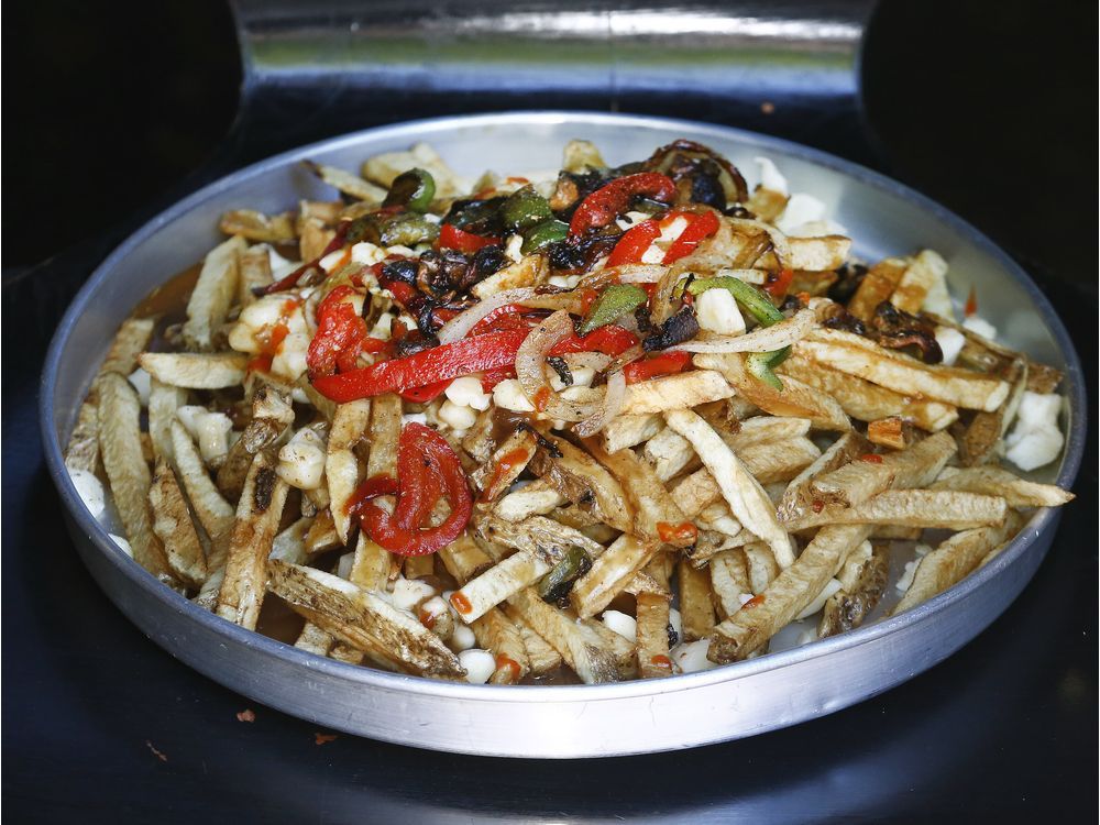 Dining Out: Ottawa's heavy-metal hangout, The Koven, serves burgers for ...