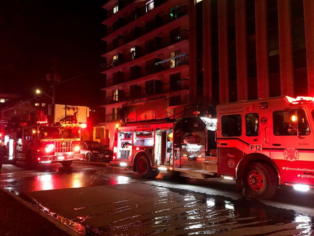 Man in 30s taken to hospital in critical condition after highrise fire ...