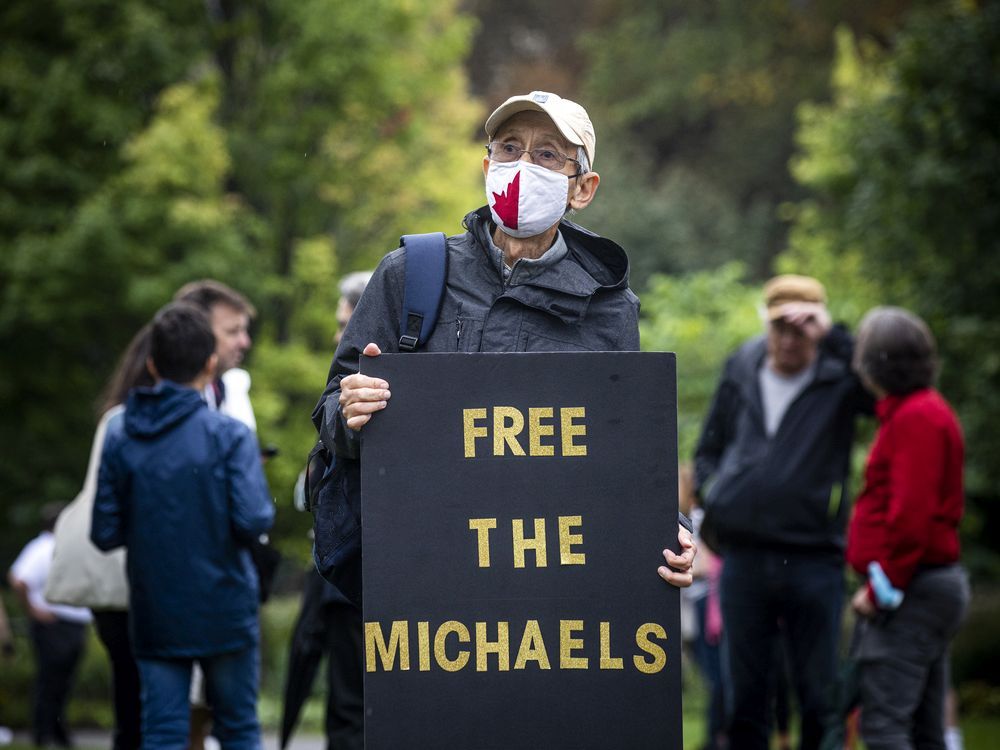 On the two Michaels' 1,000th day of captivity, hundreds march in Ottawa ...