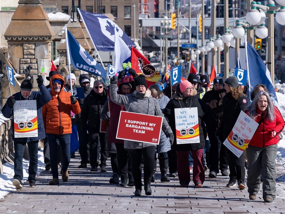 Non-Public Funds workers rally in Ottawa in bid for equal wages ...