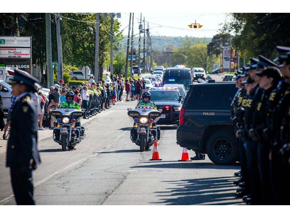 Procession carries fallen OPP officer's body home to Rockland | Ottawa ...