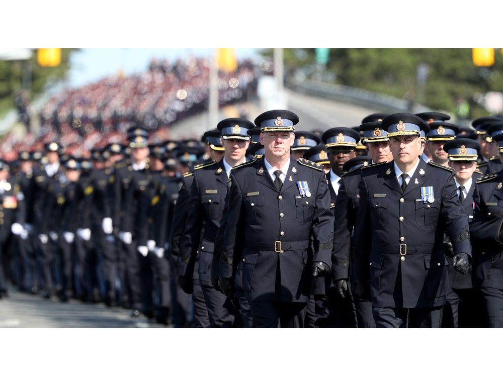 Photos: Thousands pay tribute to Sgt. Eric Mueller | Ottawa Citizen