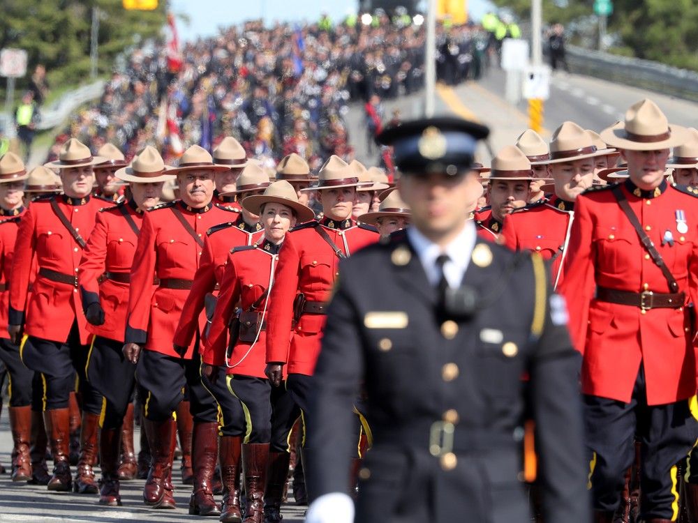 Photos: Thousands pay tribute to Sgt. Eric Mueller | Ottawa Citizen