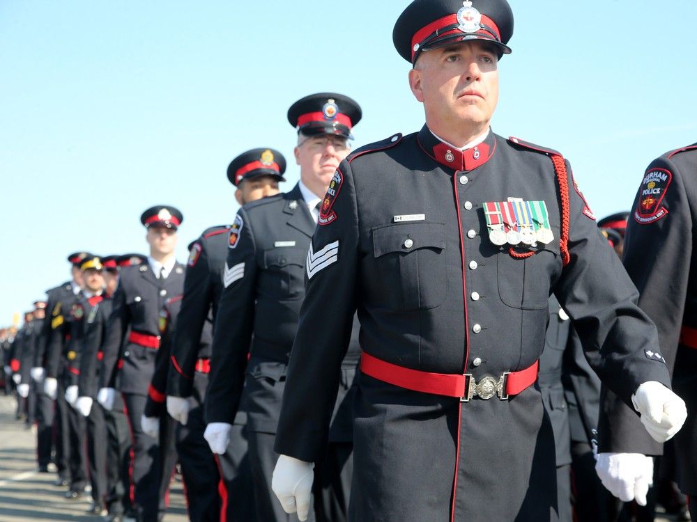 Photos: Thousands pay tribute to Sgt. Eric Mueller | Ottawa Citizen