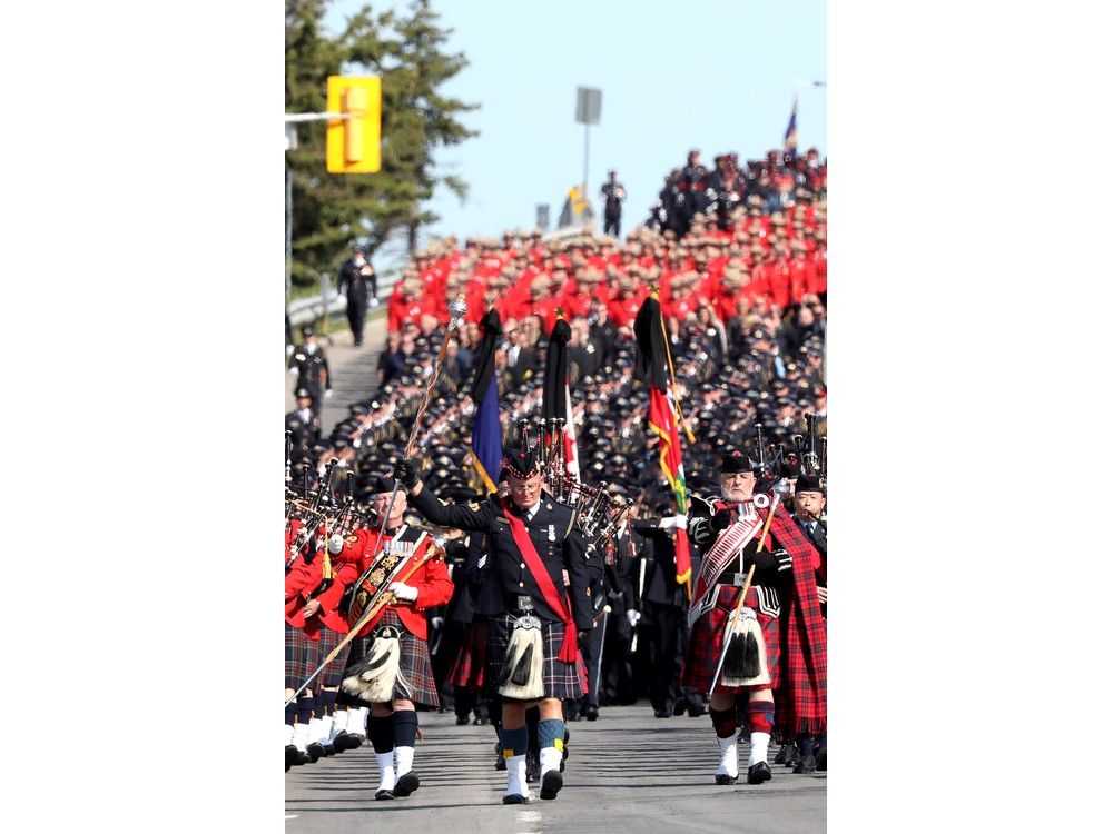 Photos: Thousands pay tribute to Sgt. Eric Mueller | Ottawa Citizen