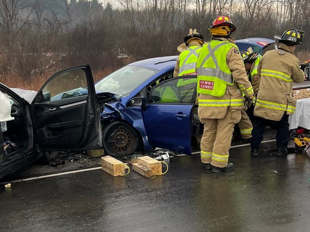 Firefighters rescue driver trapped in vehicle mangled in collision ...