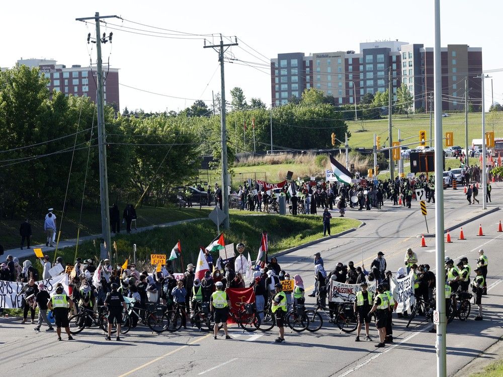 Ottawa police arrest 13 protesters during CANSEC trade show | Ottawa ...