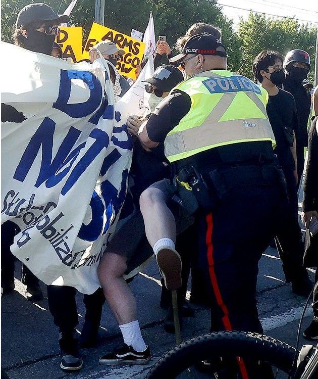 Ottawa police arrest 13 protesters during CANSEC trade show | Ottawa ...