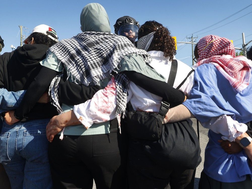 Ottawa police arrest 13 protesters during CANSEC trade show | Ottawa ...