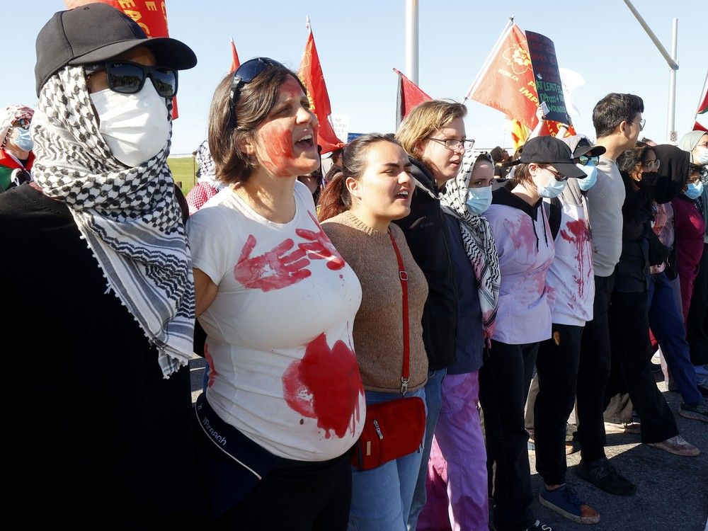Ottawa police arrest 13 protesters during CANSEC trade show | Ottawa ...