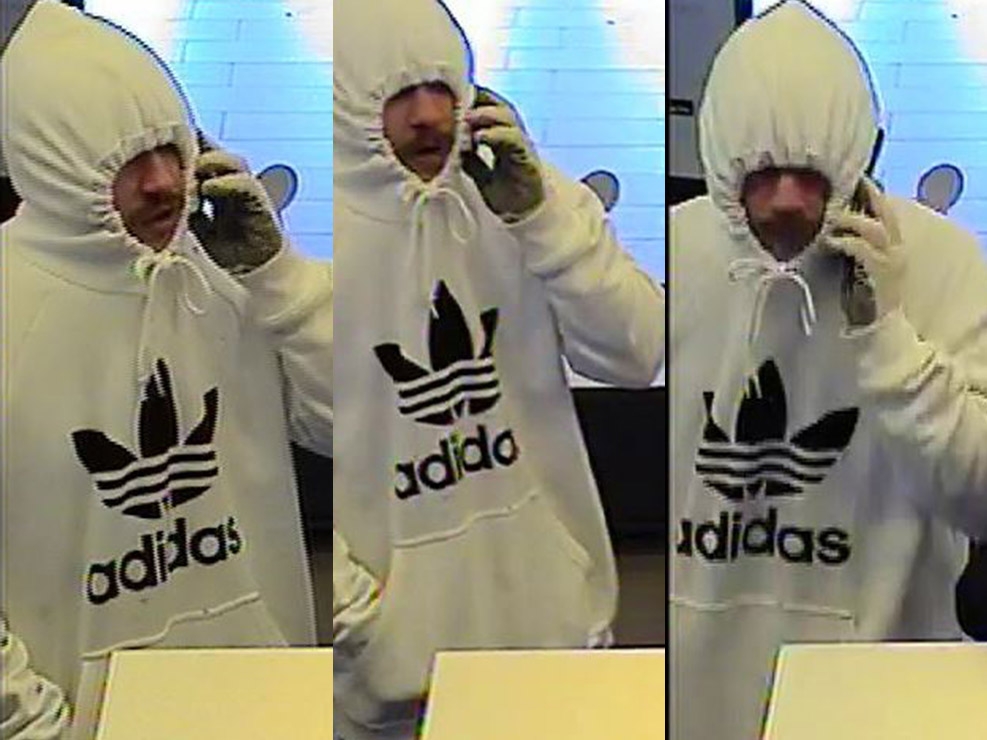 Police hunting for bank robber disguised in giant condom-like outfit ...