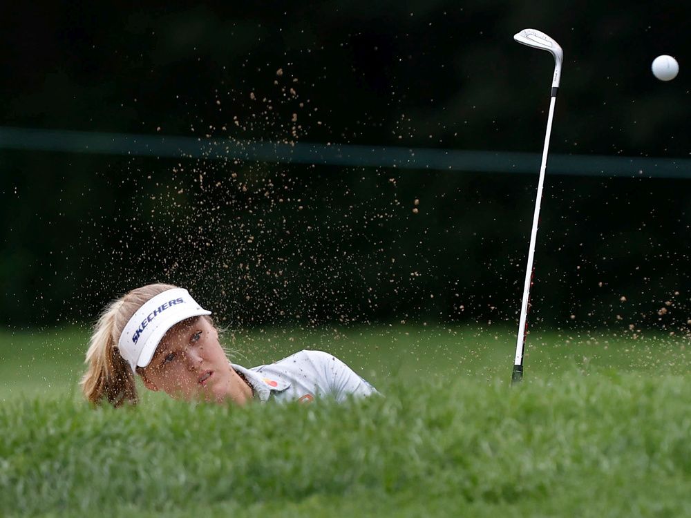 Brittany Henderson still loving her gig as caddie for sister Brooke ...