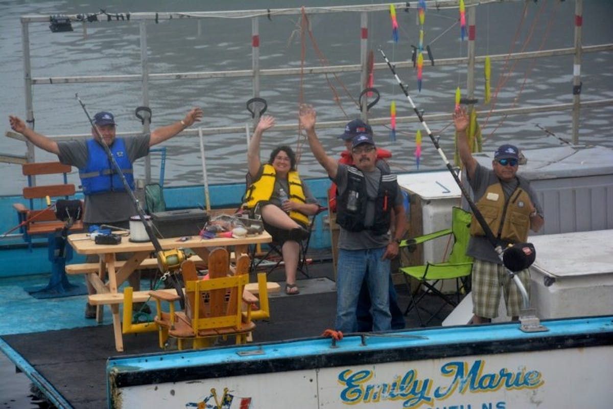 PHOTOS: A foggy send off, fishing safety demo & mackerel toss part of ...