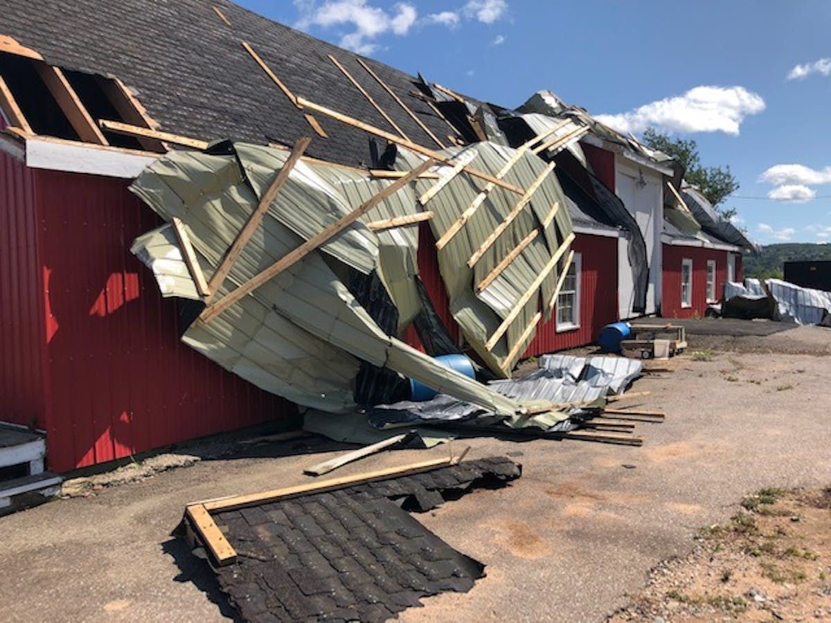 ‘Peeled it off like a banana’: Dorian rips metal roof off barn at ...
