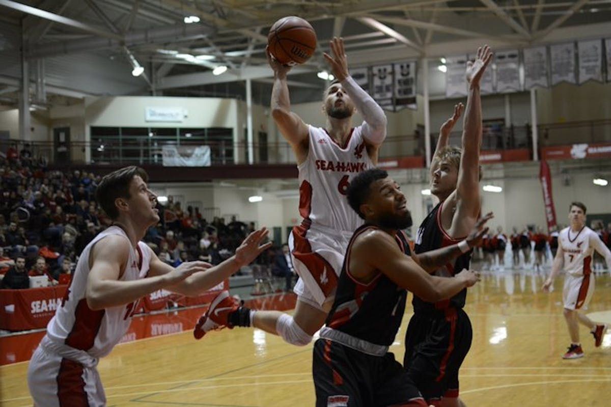 AUS men's basketball: Memorial men work overtime, but can't complete ...