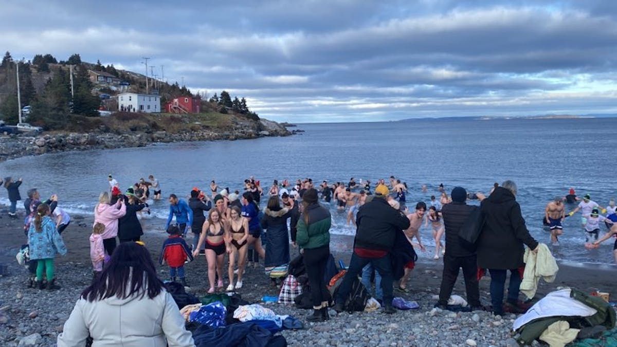 'Brave, brave bunch': Over 100 kick off the New Year with Chapel's Cove ...