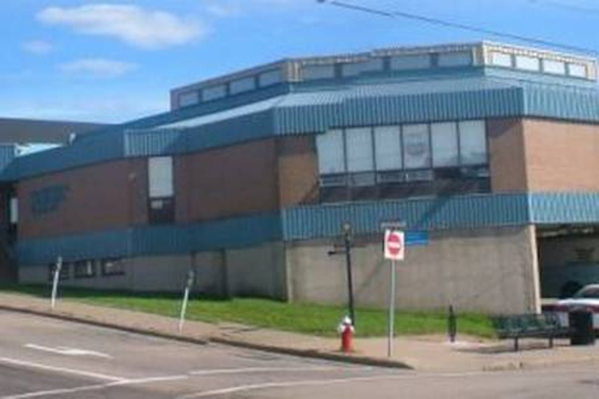 Mysterious hole appears in Sydney library window | PNI Atlantic News