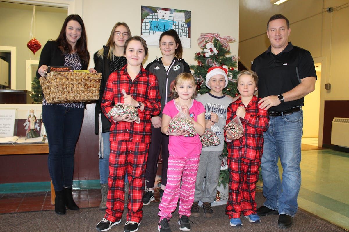 Summerside high school students donate books to feeder schools | PNI ...