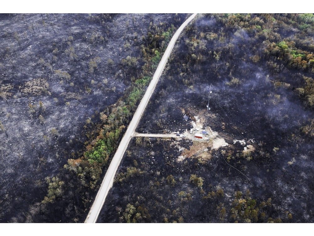 Crews keep Long Lake fire from growing for third day; high winds loom ...