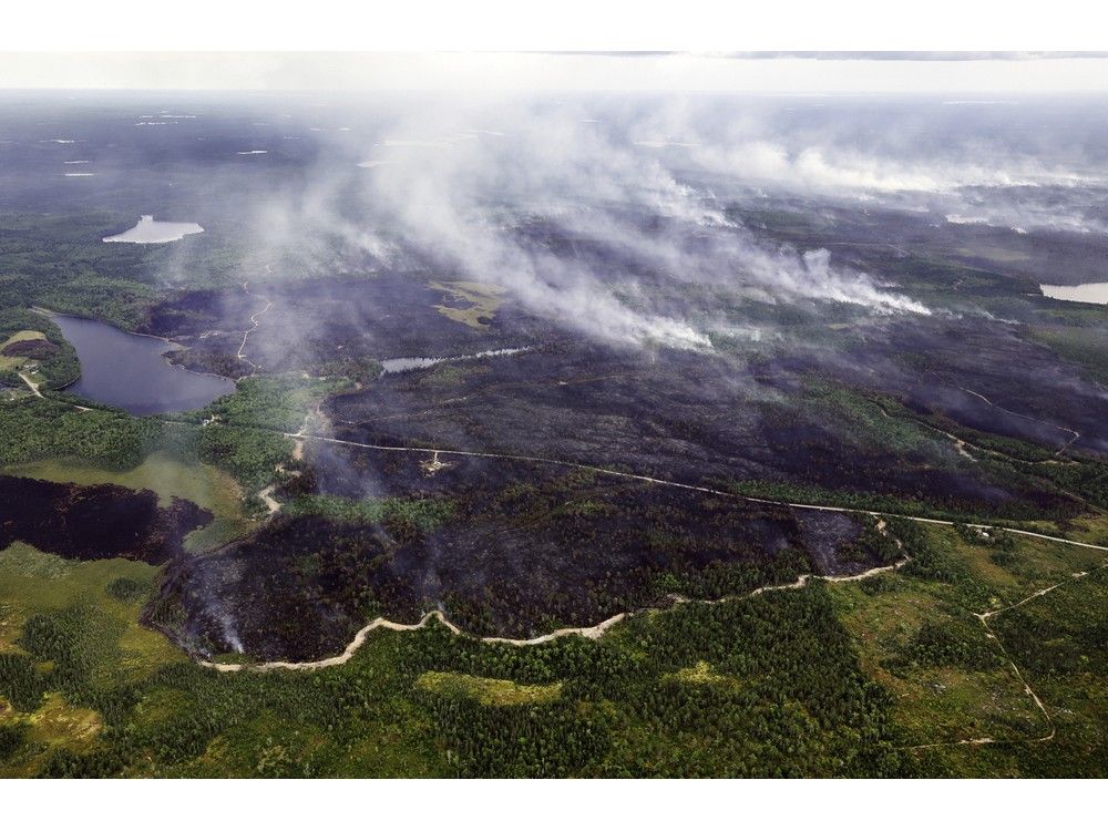 Hope on horizon: substantial rain could fall on Long Lake fire Monday ...