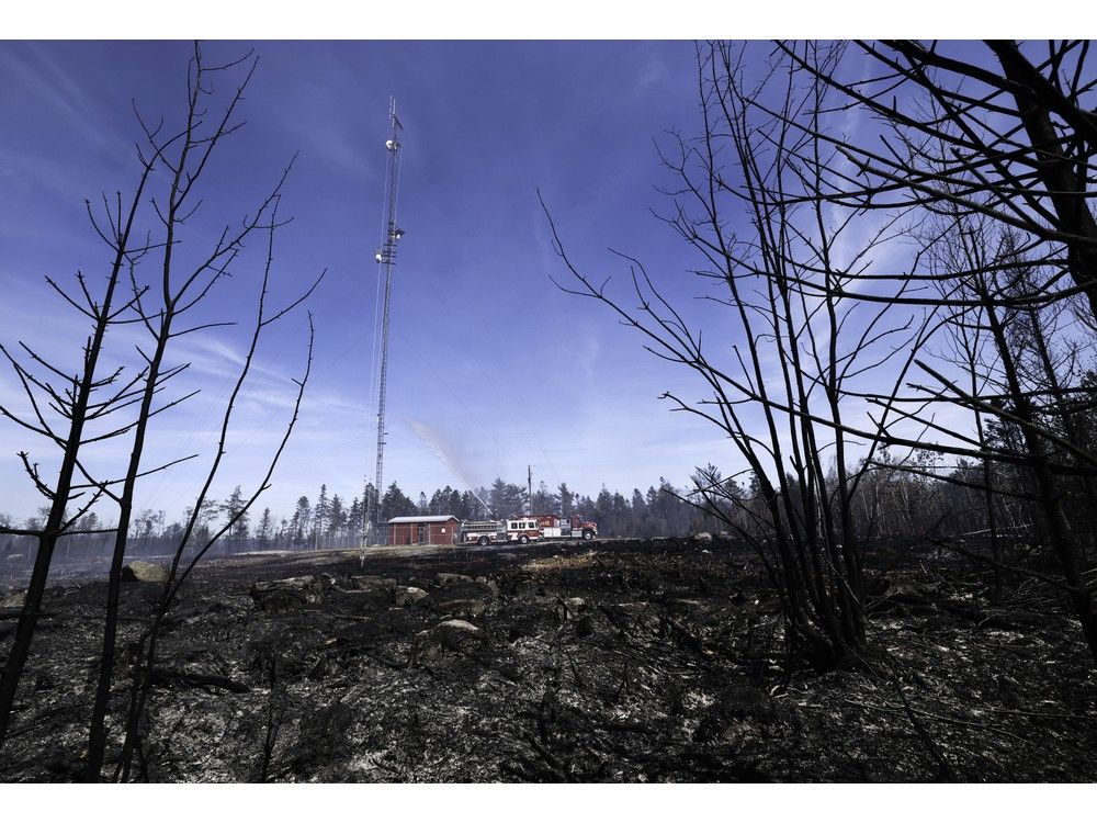 Crews keep Long Lake fire from growing for third day; high winds loom ...