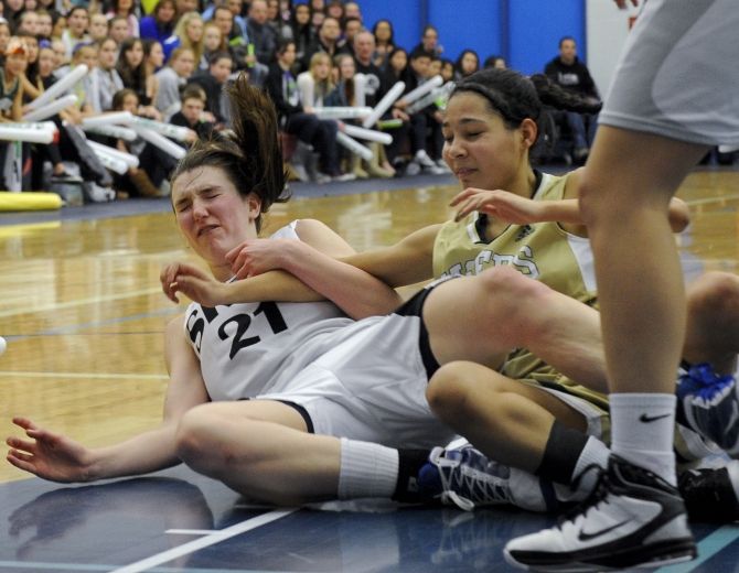 Wolfram blocks out pain, then blocks Tigers as Titans win BC Triple A ...