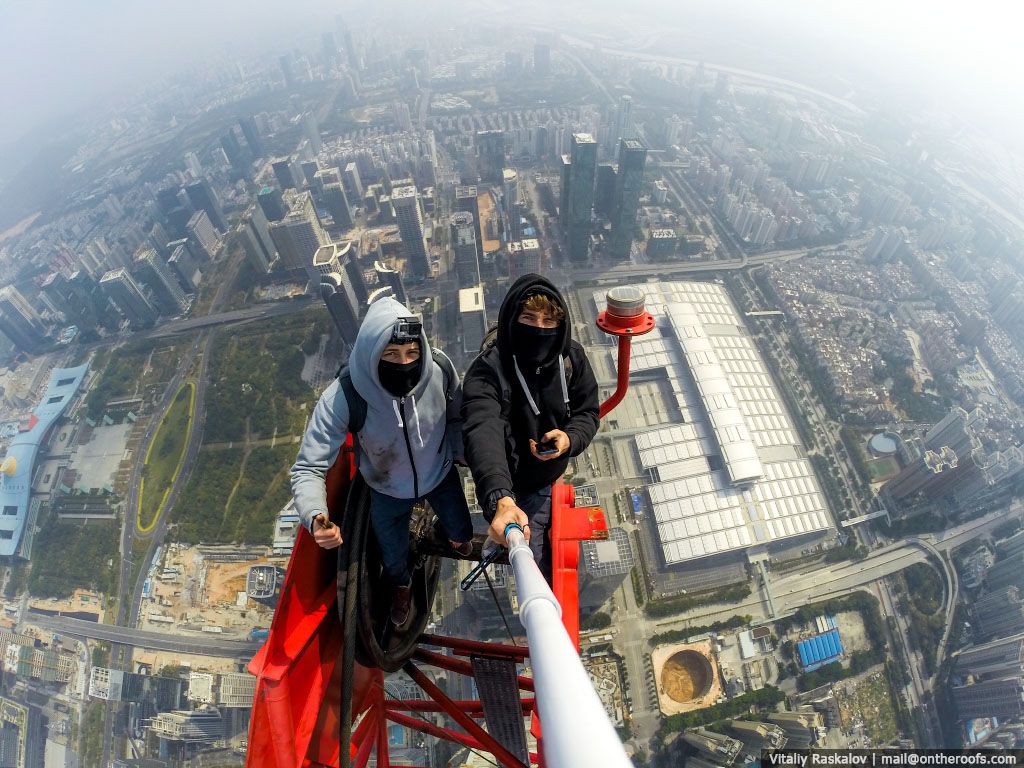 Watch a couple of crazy young men climb the second tallest tower in the ...