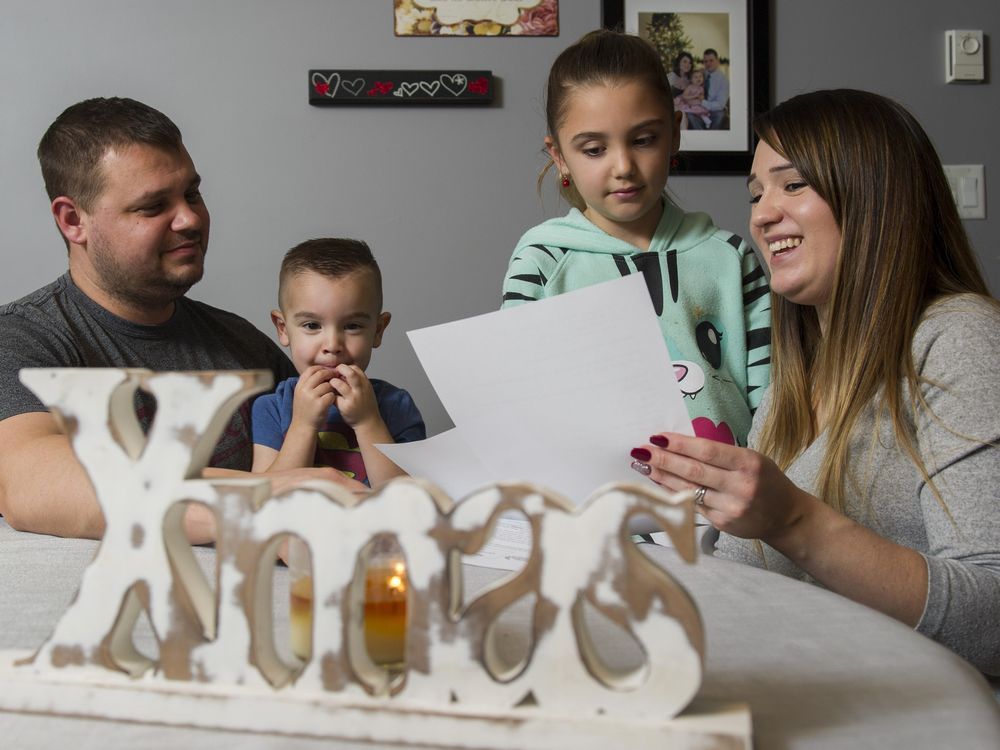 A Surrey family adds meaning to their Christmas by 'adopting' a family ...