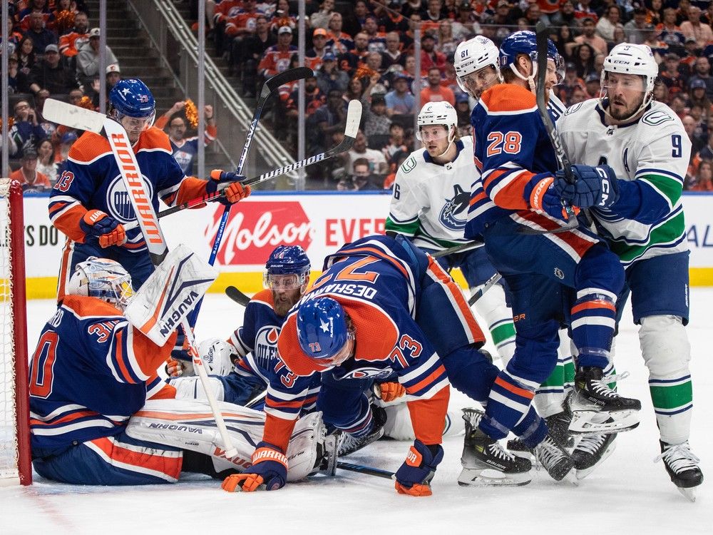 Photos: It's the Canucks. It's the Oilers. It's Game 4 in Edmonton ...