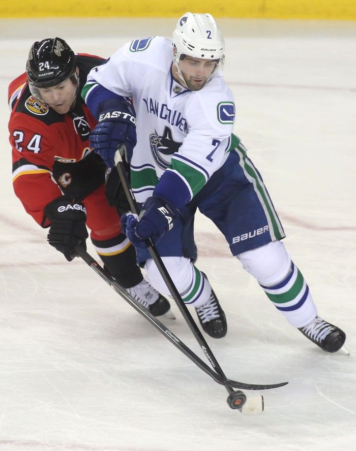 Hamhuis never wanted to leave Canucks, saying 'I was bleeding blue ...