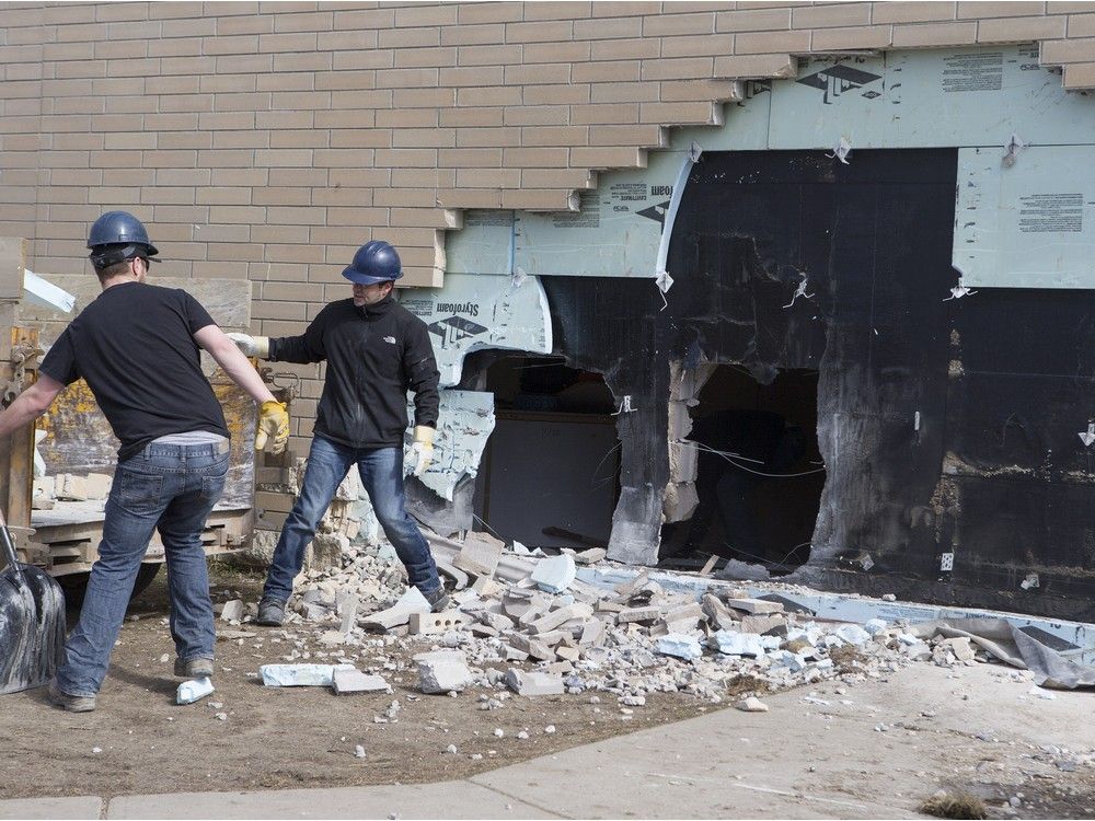 Gallery: Clean-up crews sift through rubble at Silverspring School ...