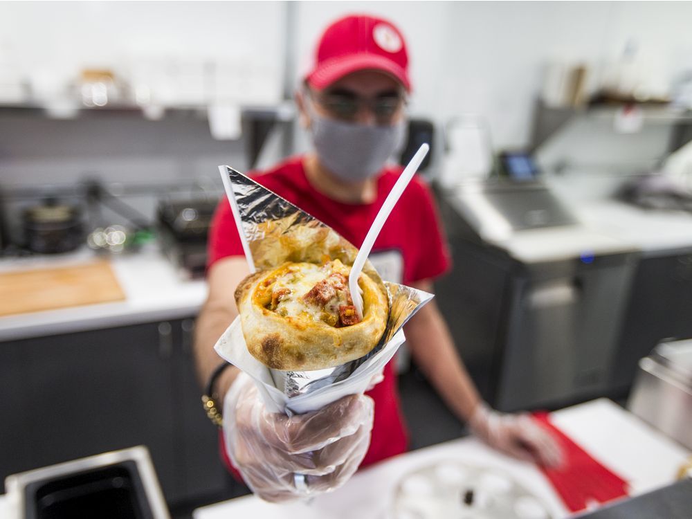 At Konz Pizza in Saskatoon you can eat pizza like an ice cream cone ...