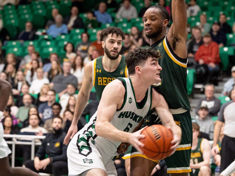 Dewar's drives to the hoop net No. 2 all-time Huskie scoring status ...