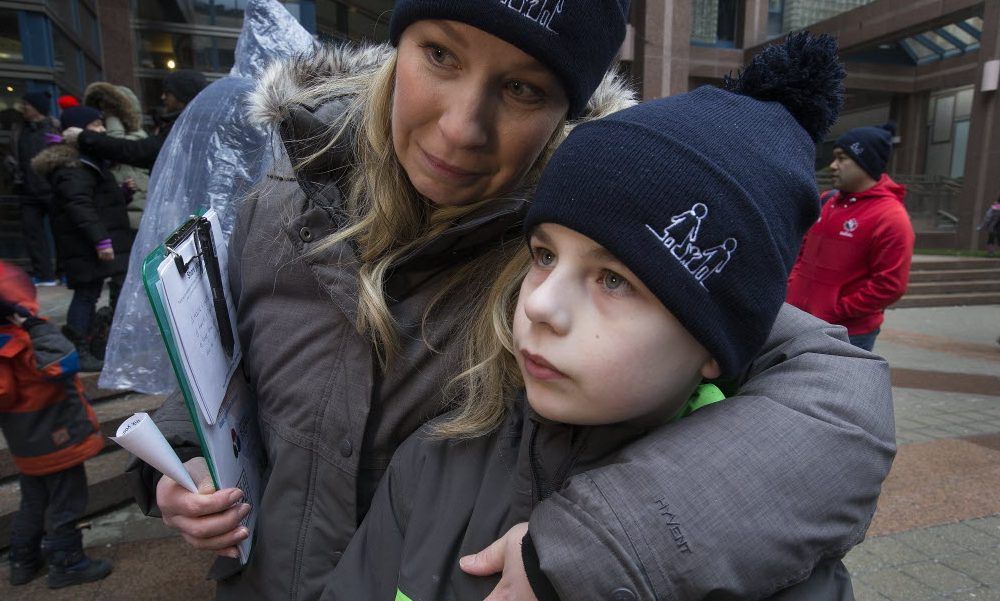 Police officers' family members protest staffing shortage | Toronto Sun