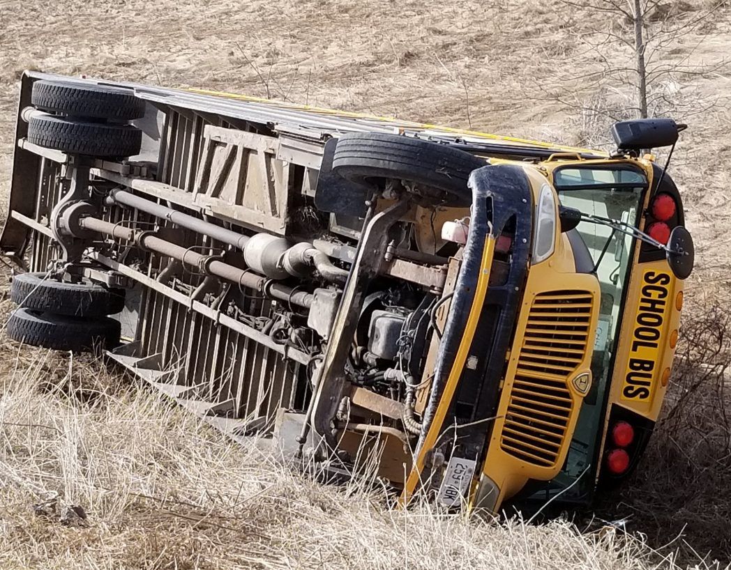 School bus rollover injures two children, driver in Clarington ...