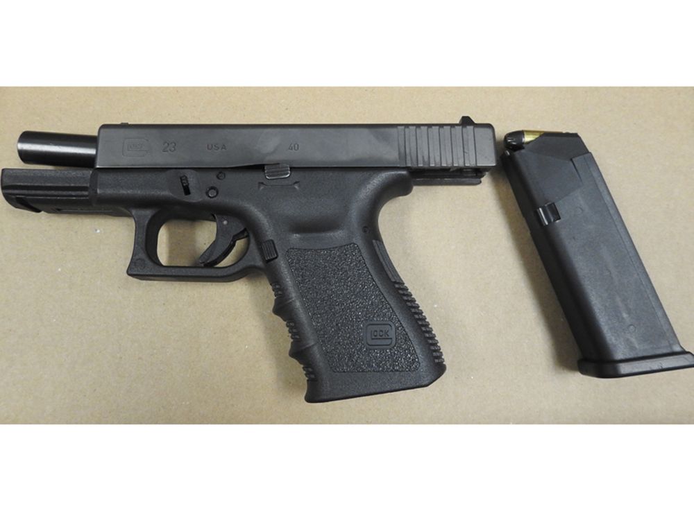 Cops pull over suspected impaired driver, find illegal handgun ...