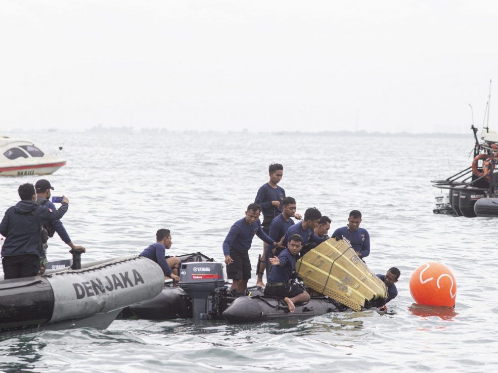 Indonesia finds body parts, debris, detects emergency signal of crashed ...