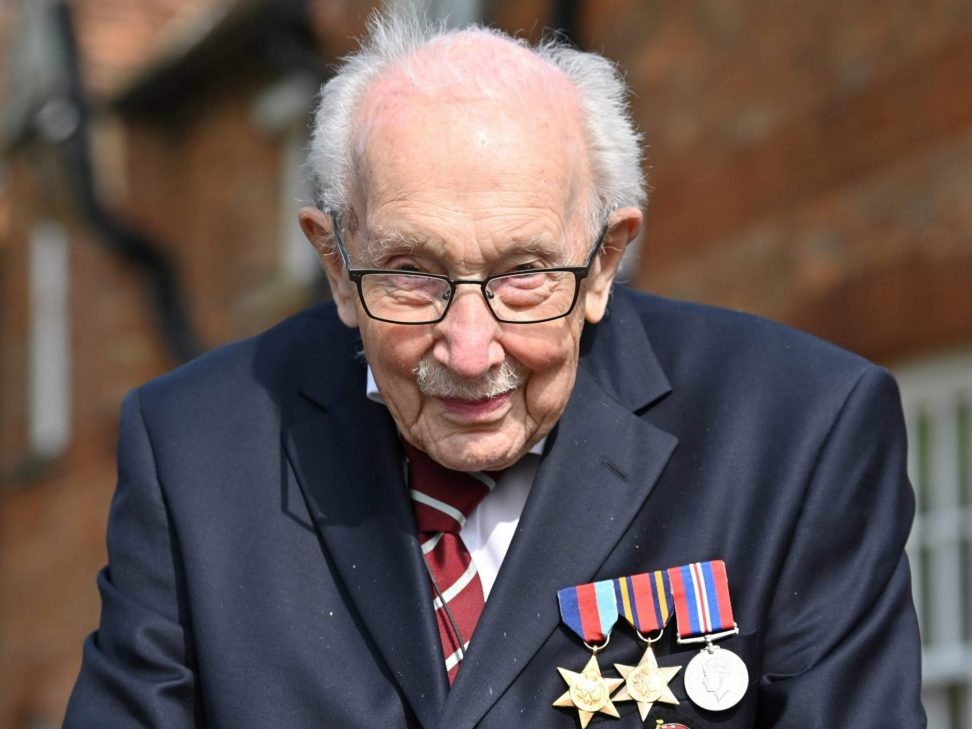 U.K.'s record-breaking fundraiser, Captain Tom Moore, dies at 100 ...