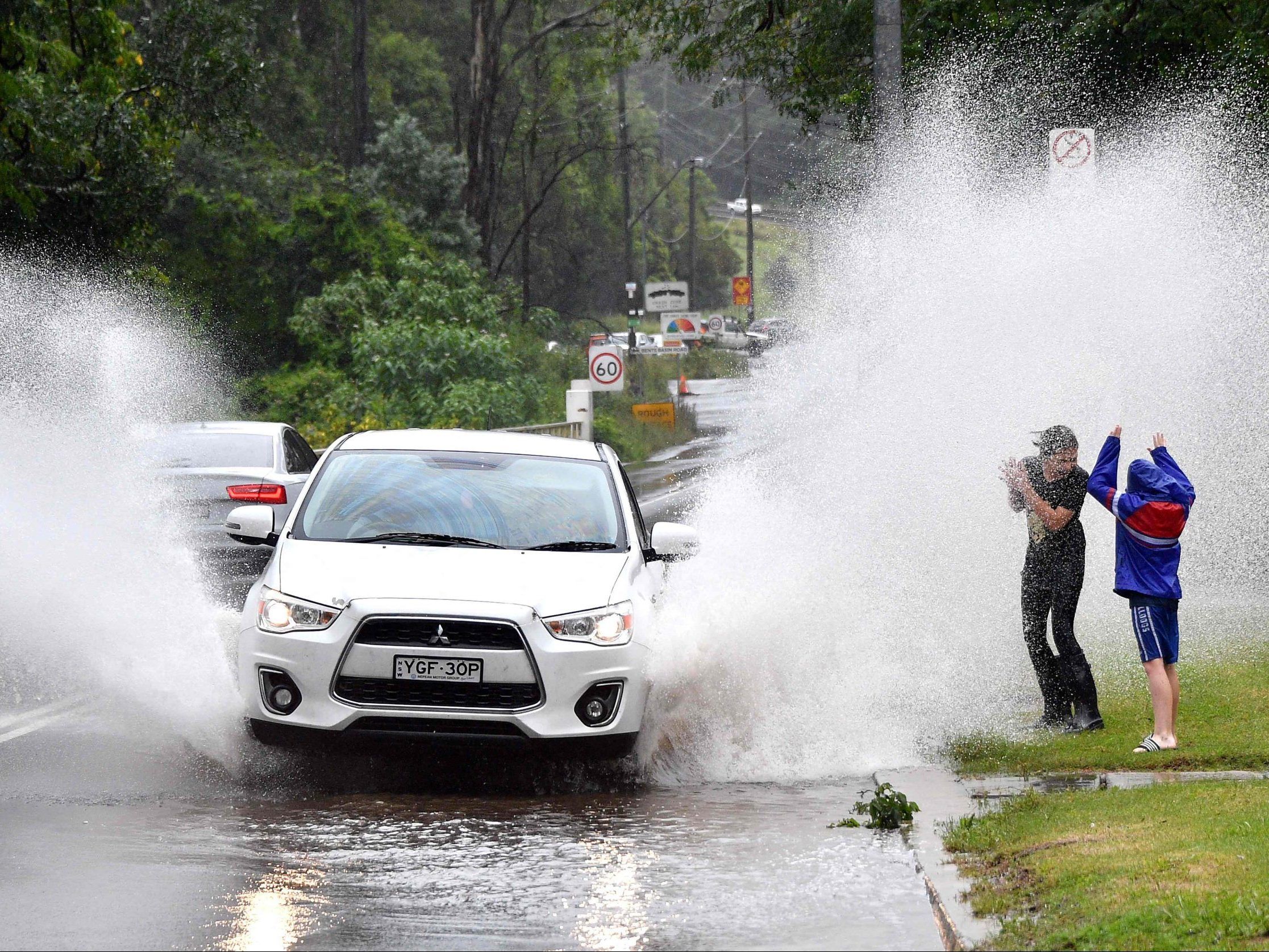 Heavy rains in Australia's east bring worst floods in 50 years ...